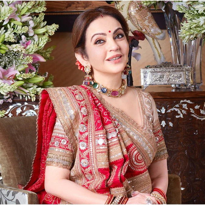 Nita Ambani Dazzles in a Rich Sindoori Red Saree Paired with Bold Gold ...